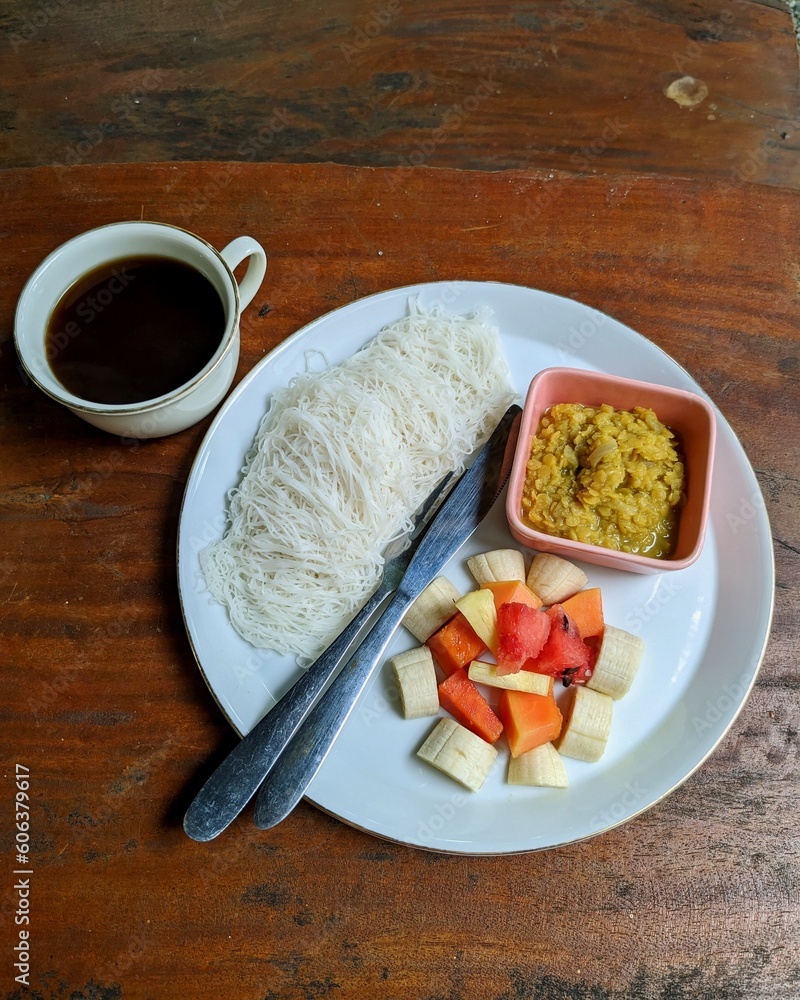 Typical Sri Lankan breakfast dish called string hoppers with red lentil ...