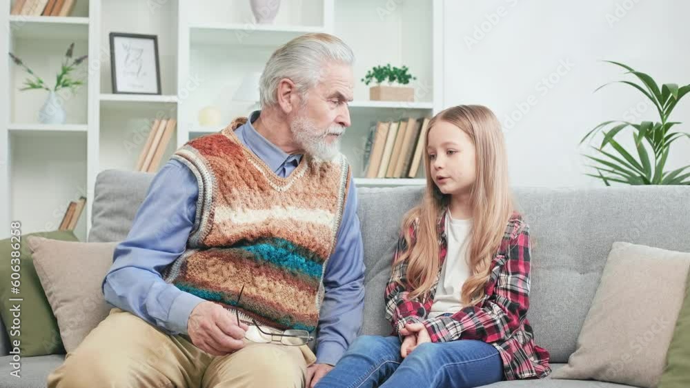 Long Haired Blond Girl Having Conversation With Grandfather About Daily