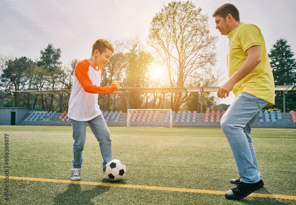 Father and Son play football on stadium, Happy family outdoors, bonding ...
