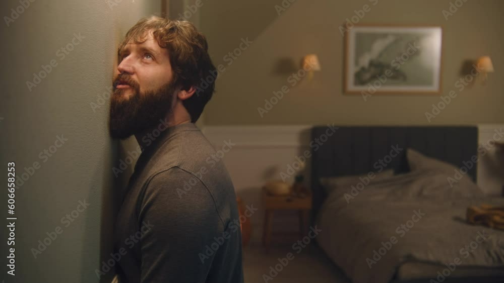 Vidéo Stock Happy man talks with neighbor woman through the wall ...