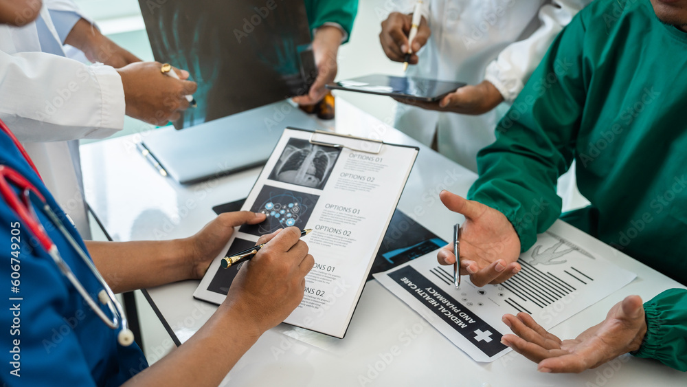 Medical surgical team meeting with doctors in white lab coats and ...