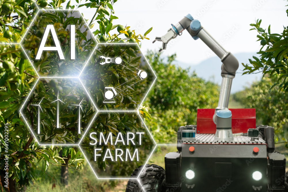 Autonomous robot harvester with robotic arm harvesting apples on a ...