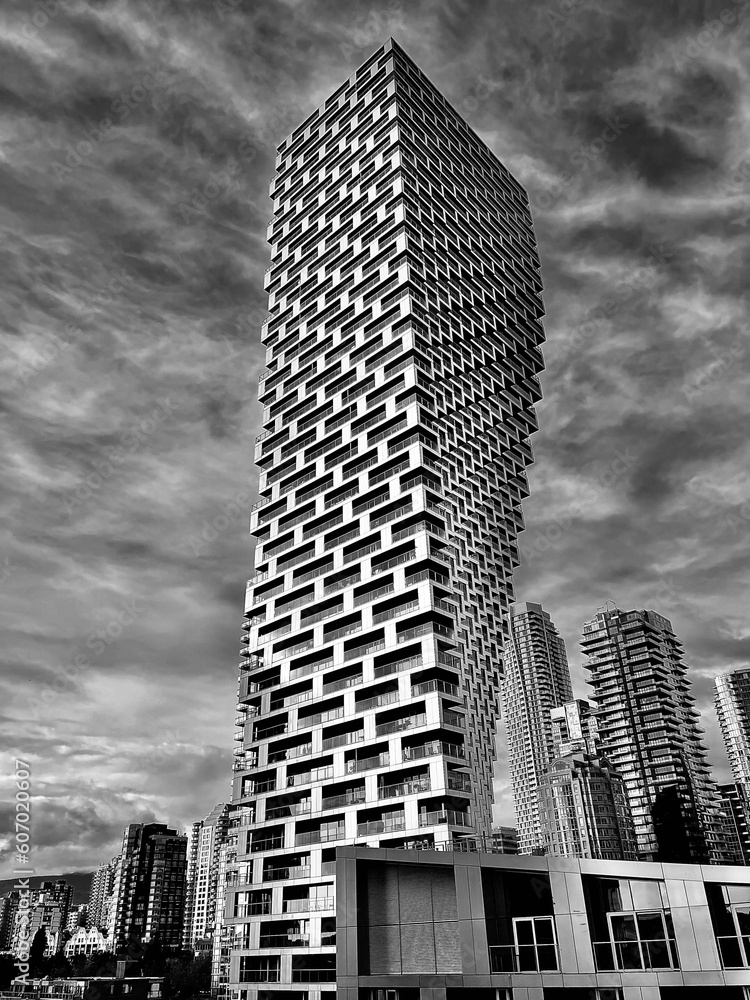 Grayscale of the unique downtown Vancouver House building in Canada ...