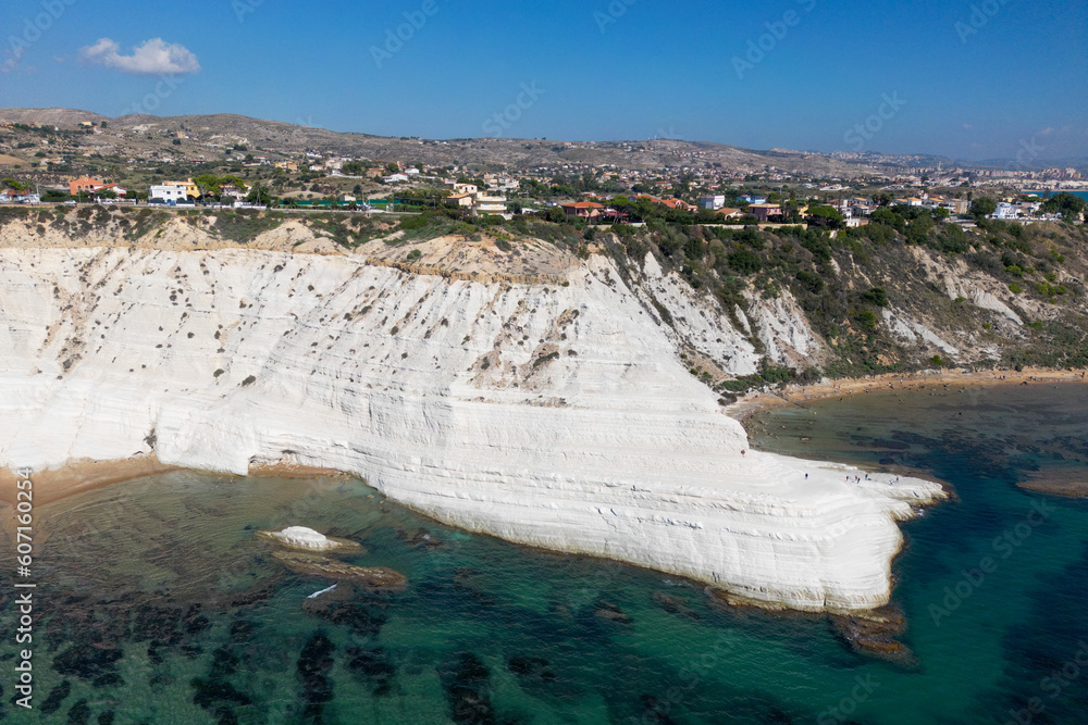 This aerial drone photo shows the famous white cliffs in Sicily. The ...