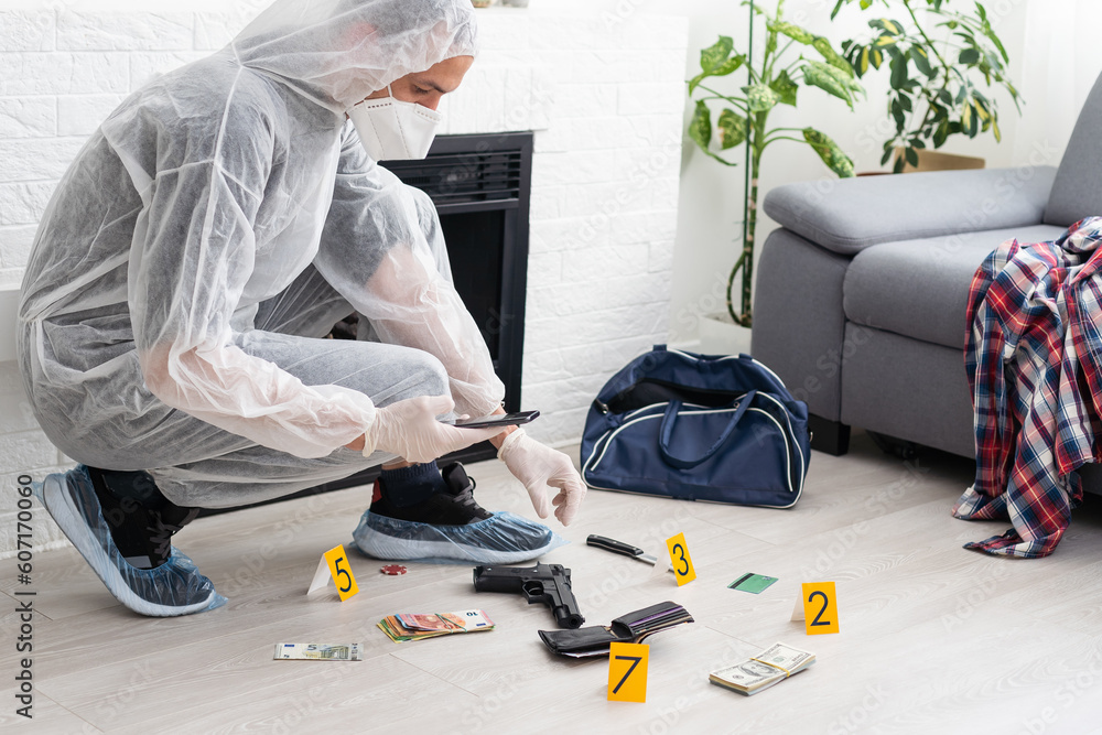 Detective Collecting Evidence in a Crime Scene. Forensic Specialists ...