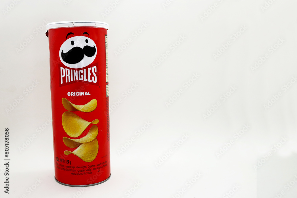 Container of Pringles brand classic flavor potato chips on isolated ...