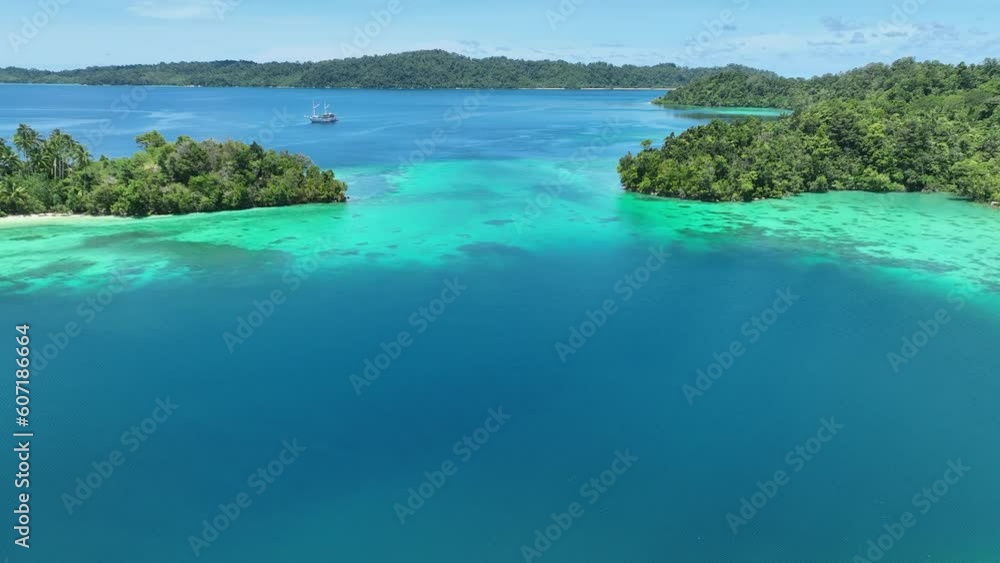 Shallow coral reefs fringe remote islands off the scenic coast of West ...