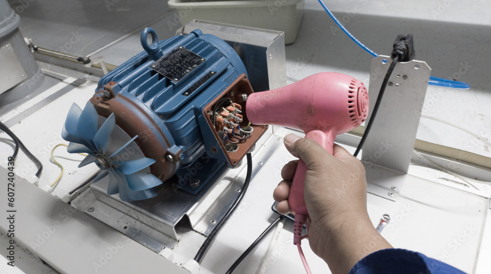 The process of drying the terminals of electric motor cables due to the ...