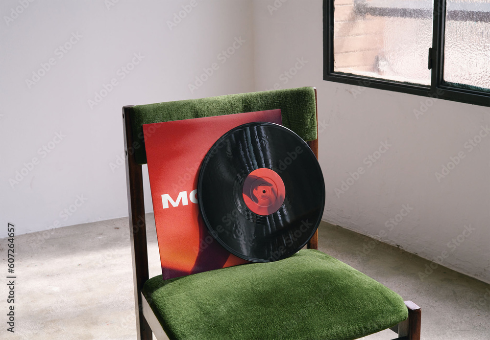 Mockup of customizable LP vinyl record album sleeve and label on chair ...