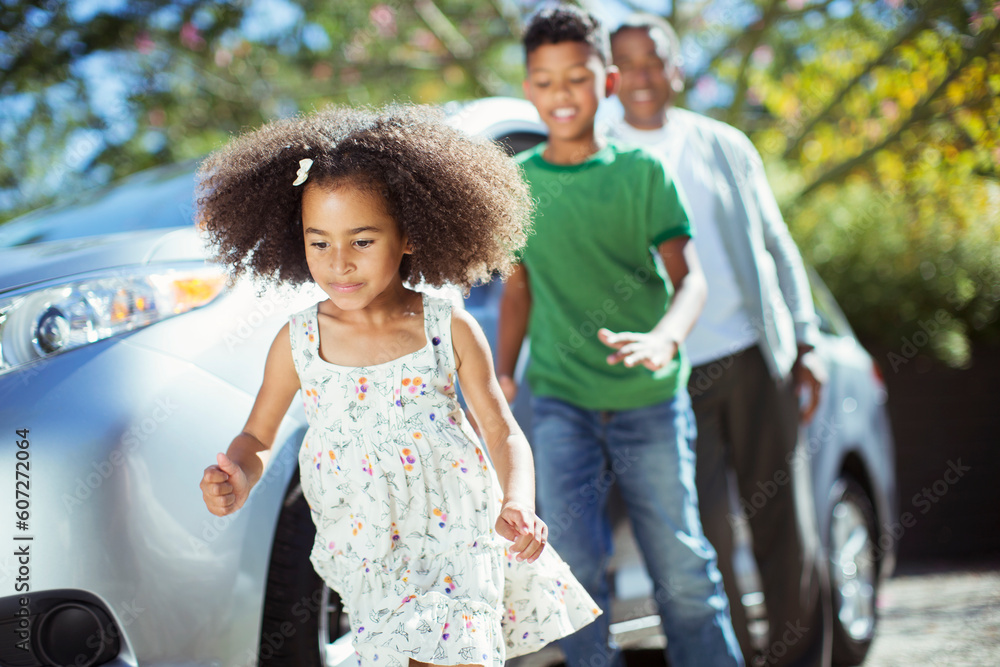 Family Running To Car
