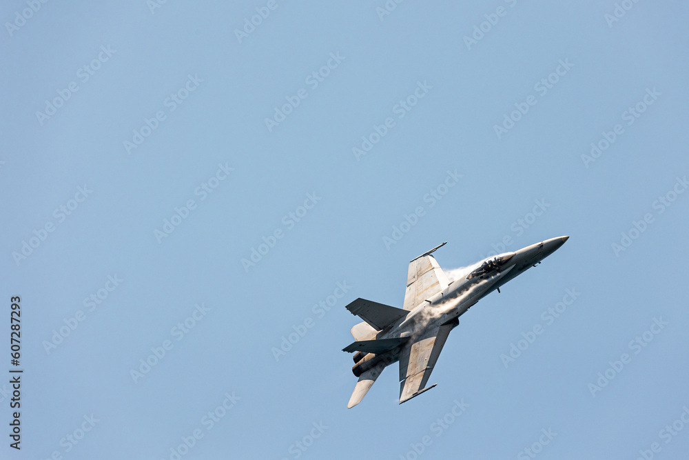 Top Lateral view of an acrobatic F-16 jet fighter in Gijon Air show ...