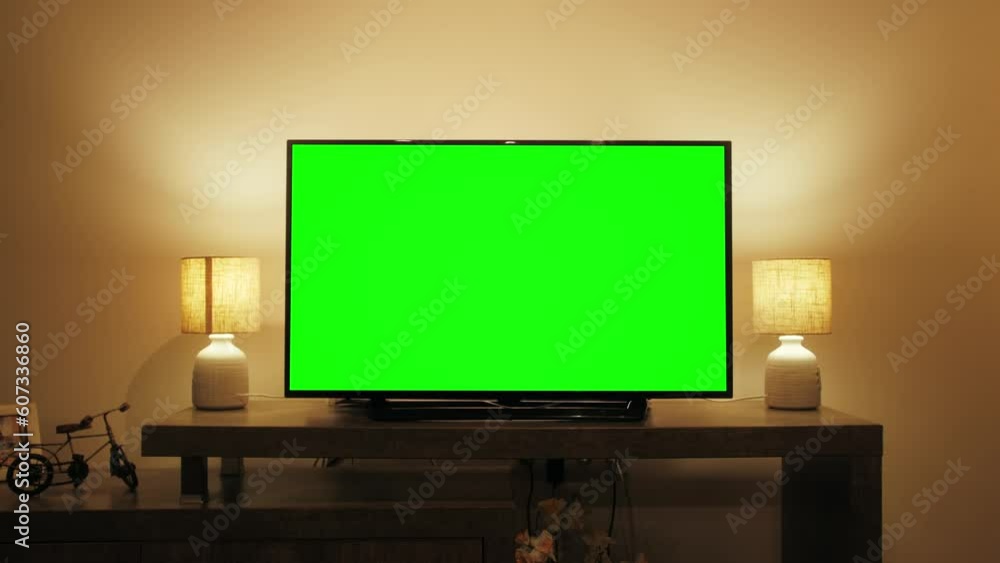 LcD Smart TV Screen With A Blank Green Background In The Living Room lcd-smart-tv-screen-with-a-blank-green-background-in-the-living-room