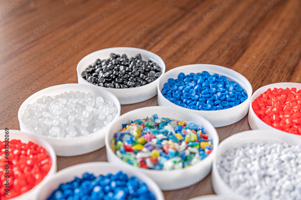White plastic grain, plastic polymer granules,hand hold Polymer pellets ...
