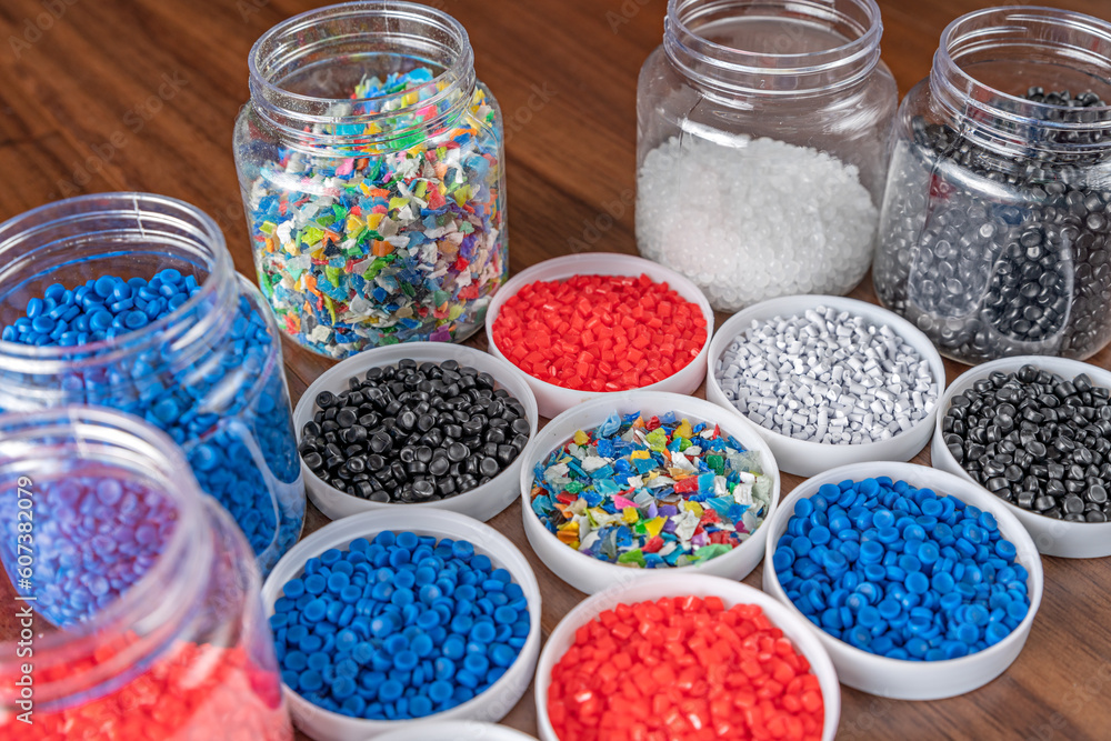 White plastic grain, plastic polymer granules,hand hold Polymer pellets ...