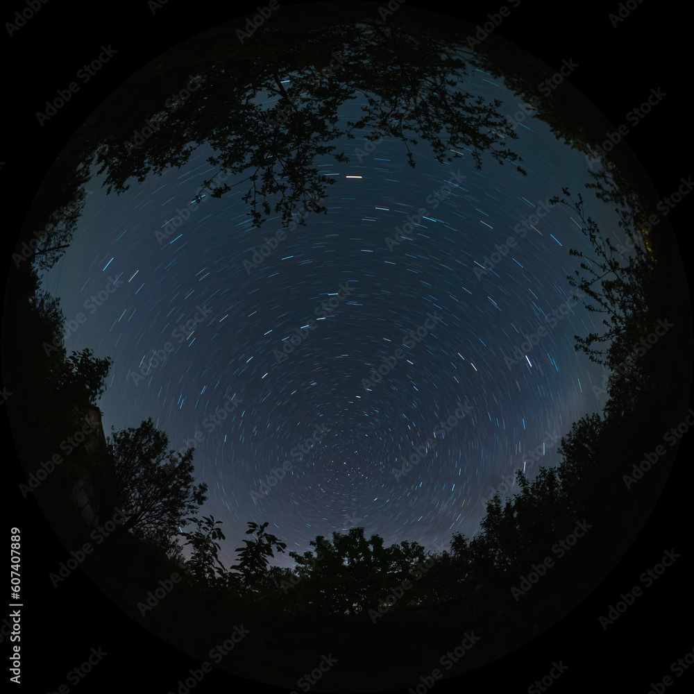 Star trails in the form of lines in the night sky with a long exposure ...