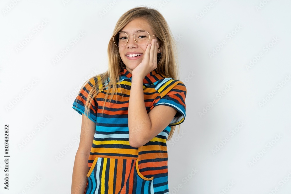 Shocked, astonished beautiful caucasian teen girl wearing striped T ...