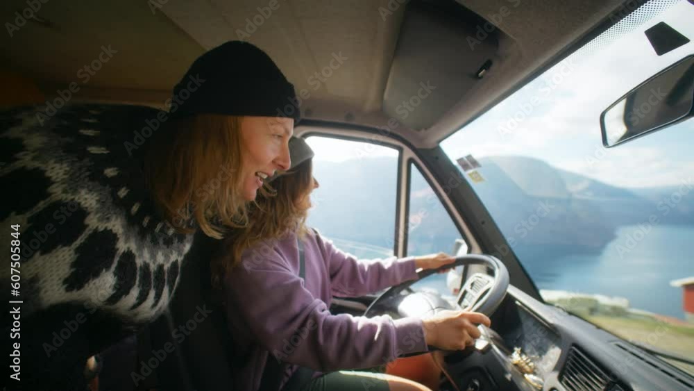 Two best female friends or couple drive in camper van, search for ...