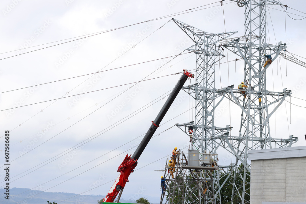 Working at height in a electricity tower Stock Photo | Adobe Stock
