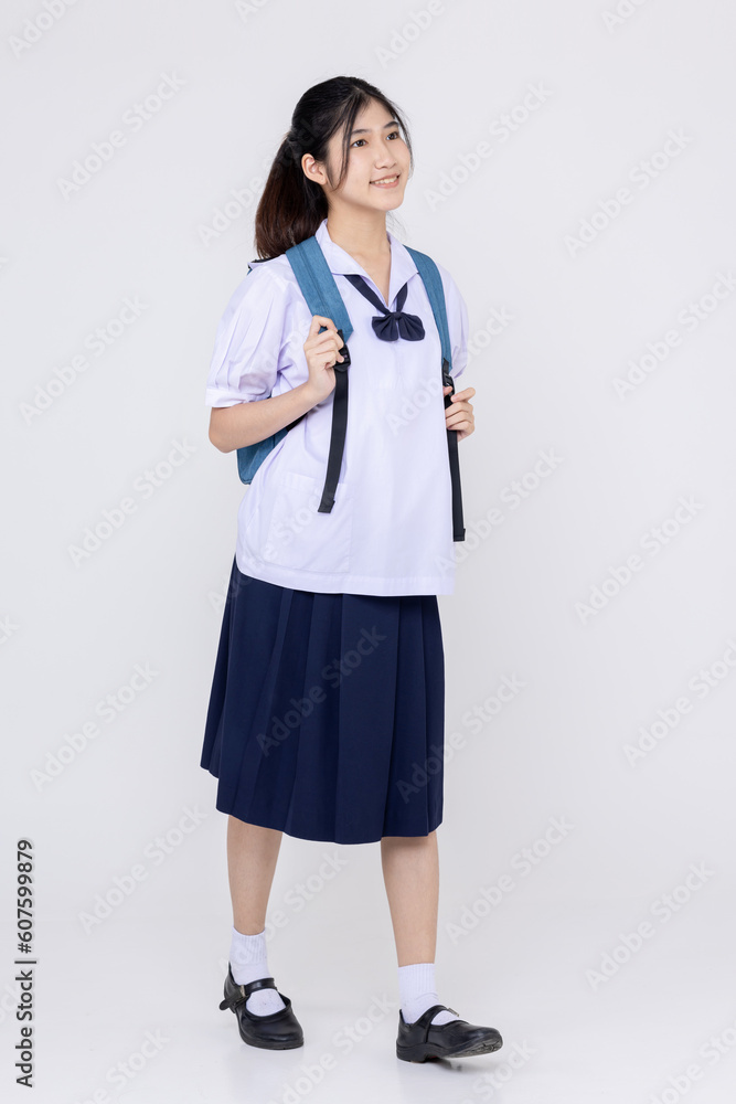 Full body portrait of happy asian student girl with uniform isolated on ...