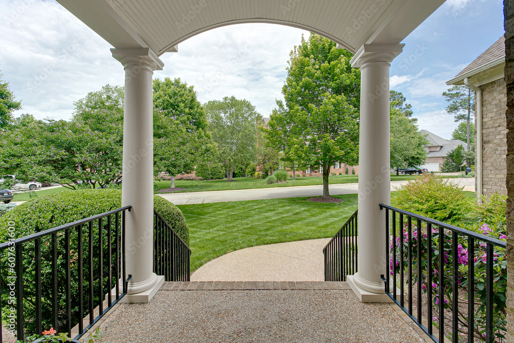 Southern Front Porch with Curved Arch Ceiling and Double White Pillars ...