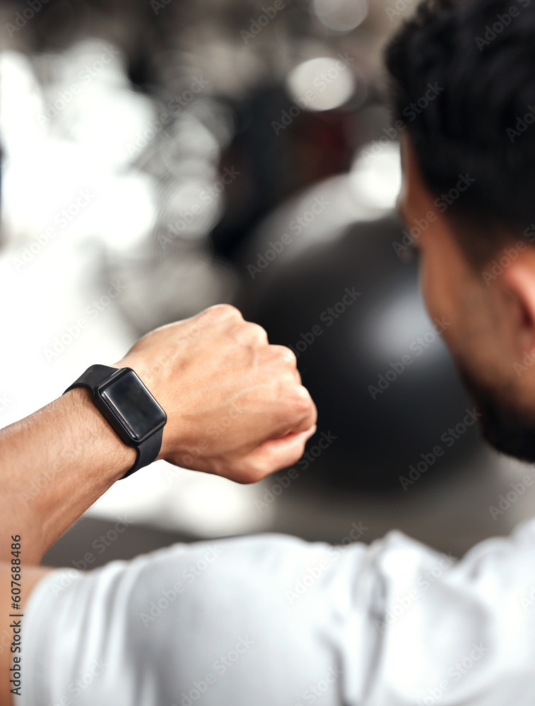 Fitness, app and man with smart watch, time and workout schedule online ...