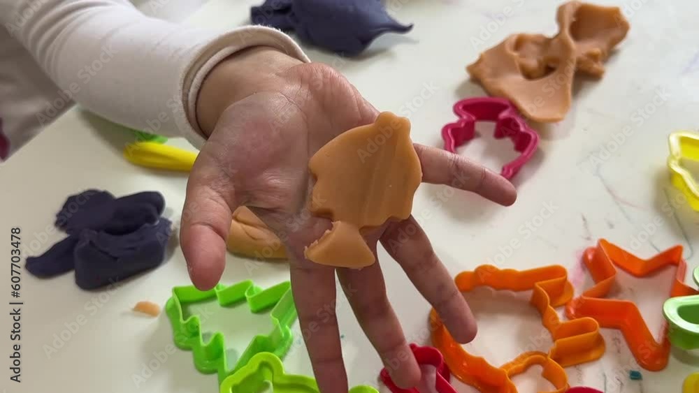 Little kids playing with play dough. Child development. Sensory ...