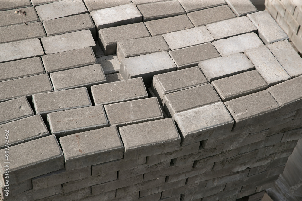 Old square paving slabs laid out in vertical rows. Processing of ...