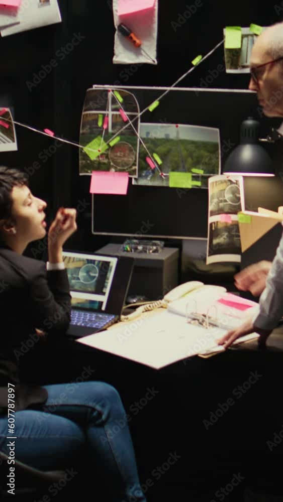 Vertical video Police officers conducts investigation using forensic ...