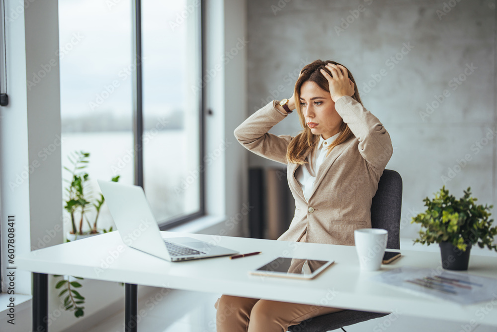Fatigued businesswoman taking off glasses tired of computer work ...