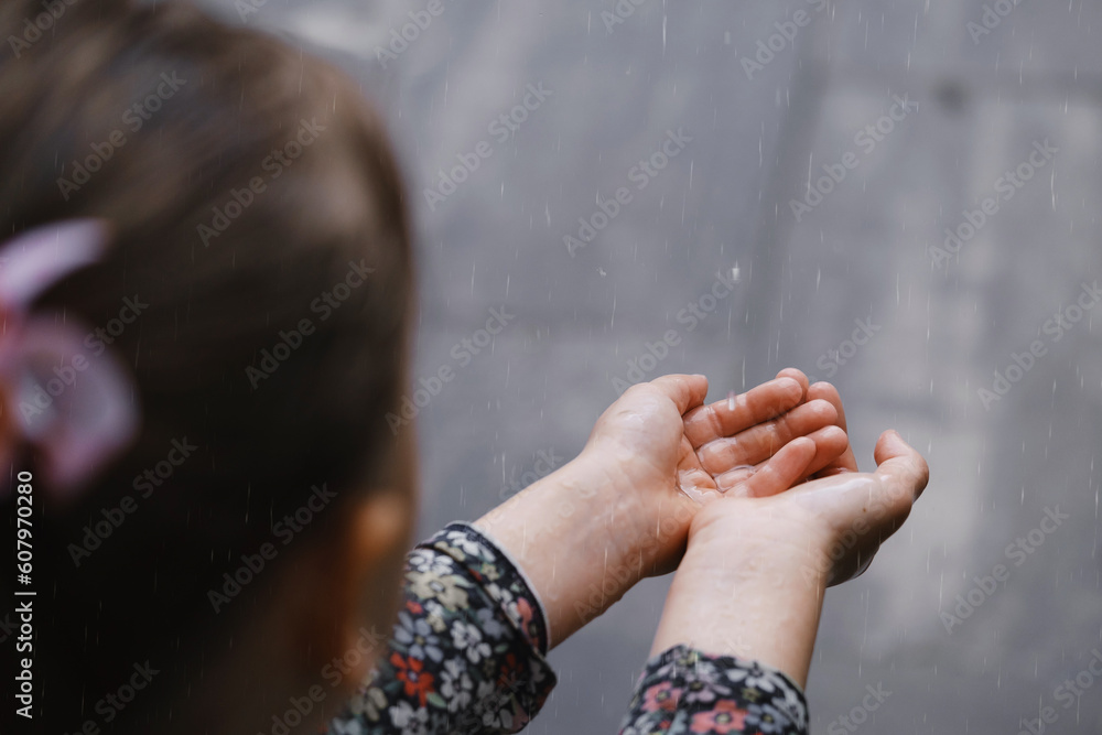 Raindrops Falling On Hands