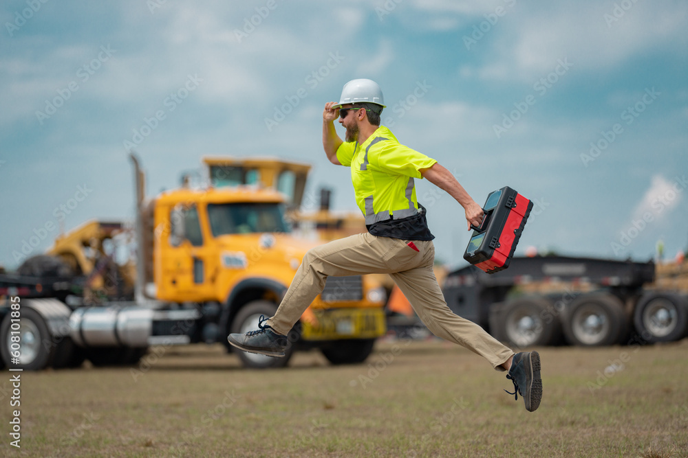 Hispanic 40 s builder excited jump on site construction. Excited ...