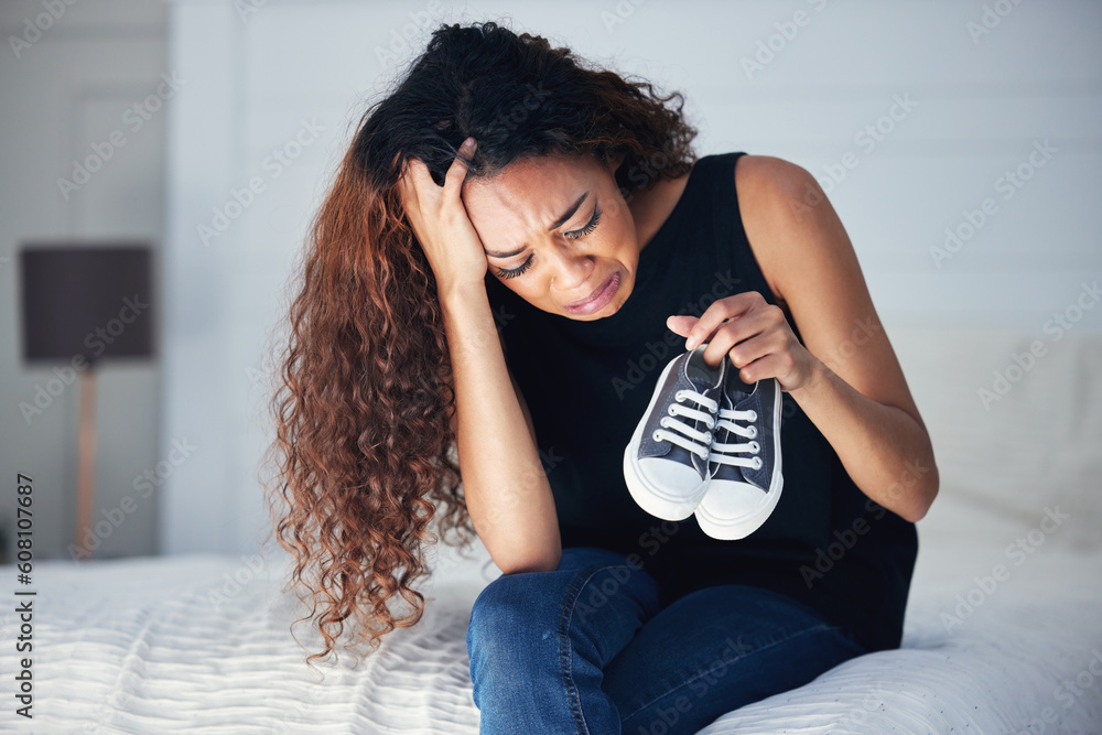 Crying, depression and woman with shoes in bedroom for grief ...