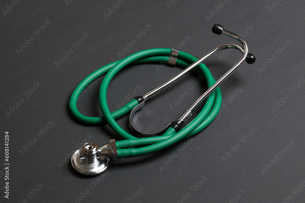 Top view of green stethoscope on colorful background. Medical diagnosis ...