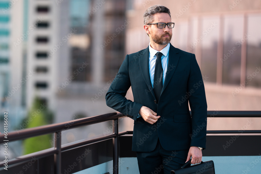 Business success, financial strategy. Businessman in front of office ...