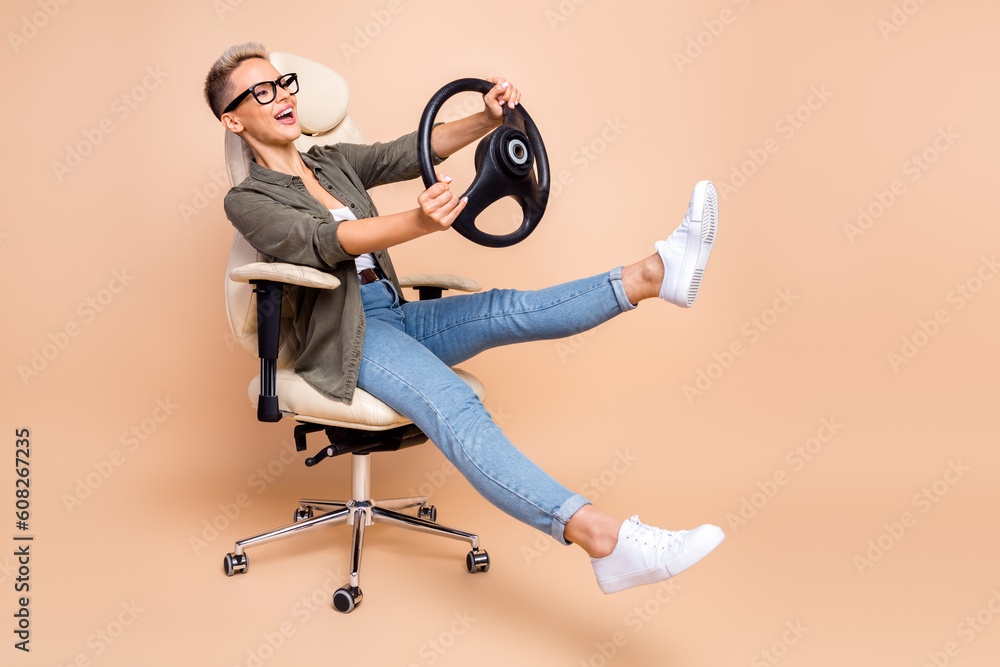 Full body size photo of overjoyed business woman boss riding steering ...
