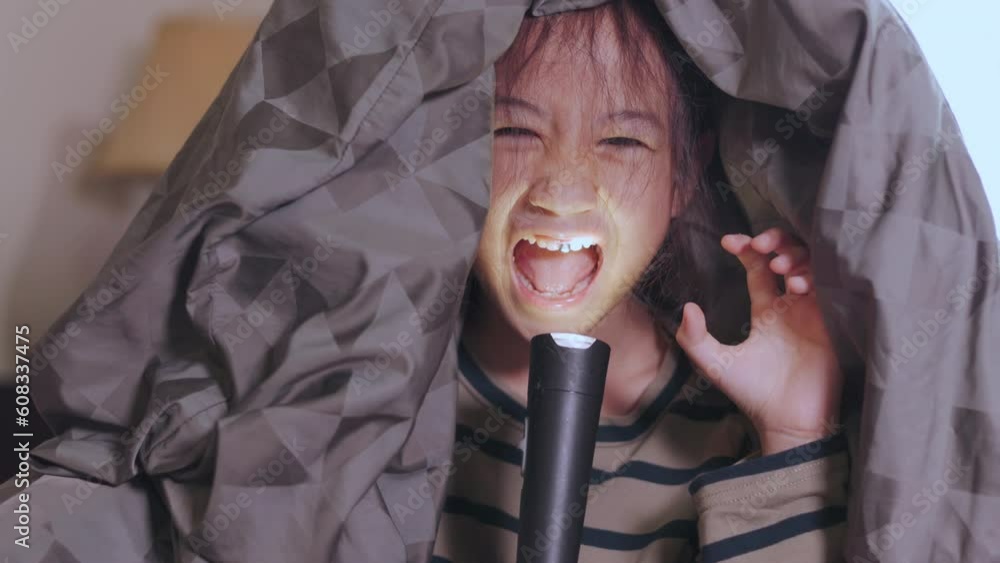 ace focusing of Adorable asian girl who is playing as ghost to make ...