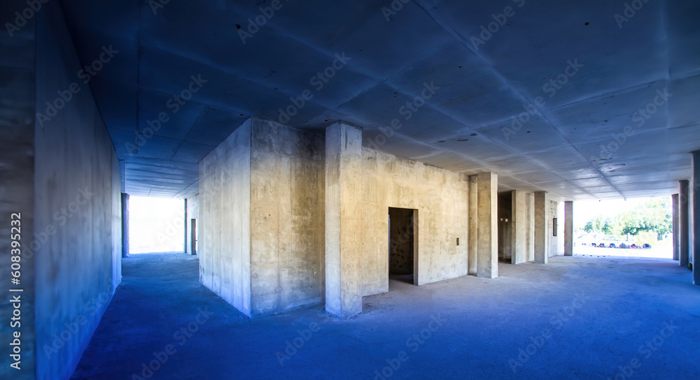 Real estate construction. Unfinished building inside view. Room with ...
