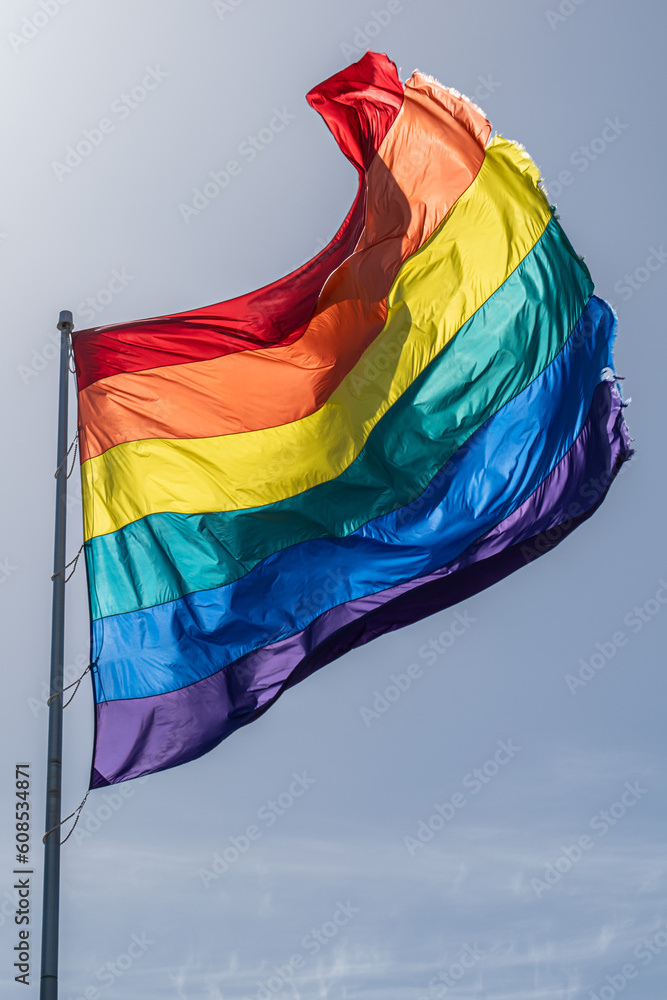 Rainbow flag blowing in the wind in the Castro District San Francisco ...