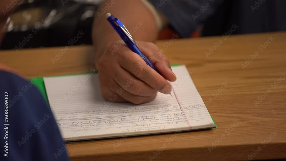 close up african american with papers writing hands in prison black ...