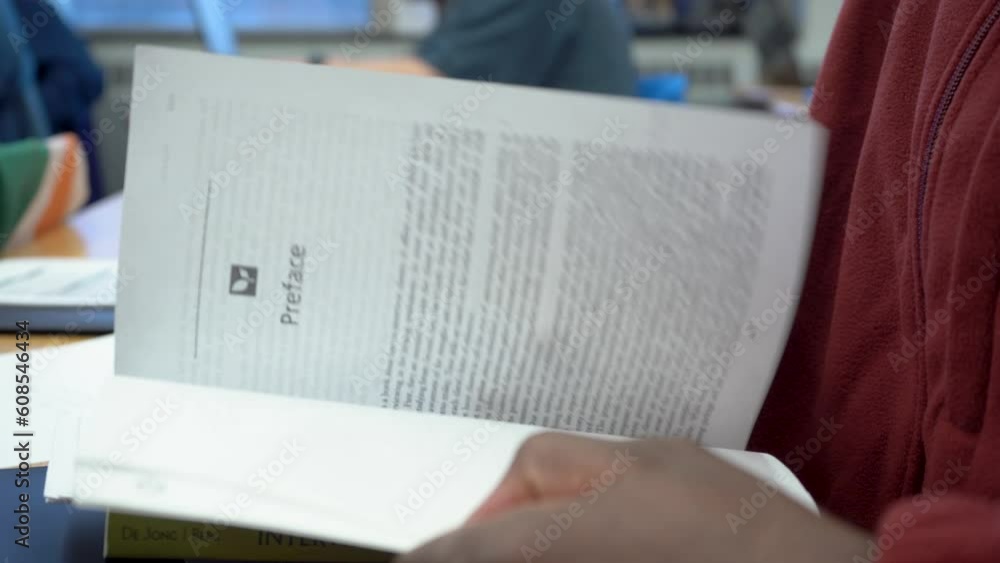 close up african american with papers reading hands in prison black ...