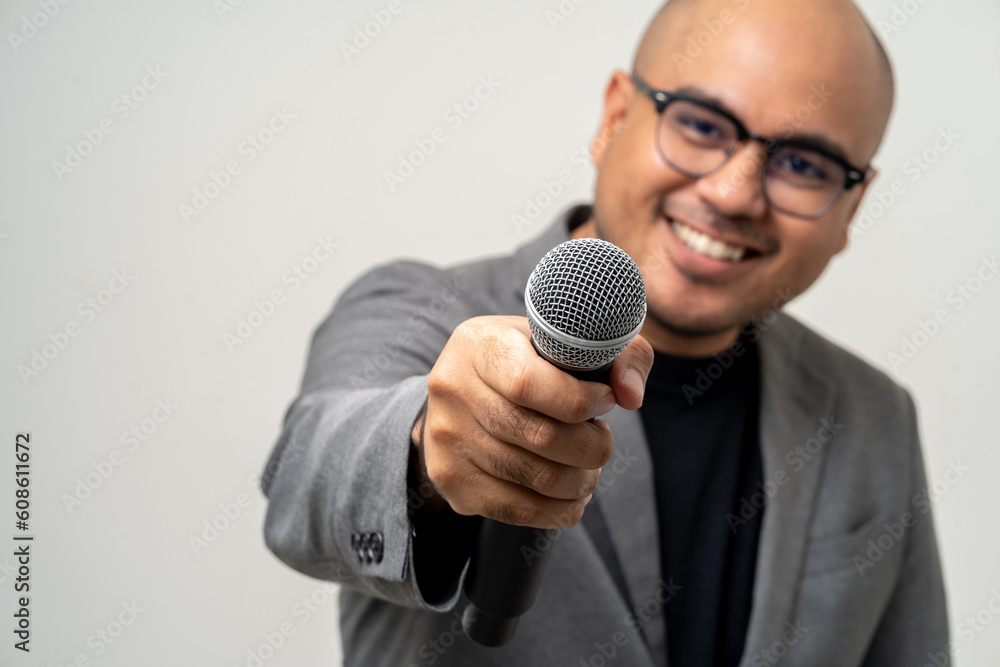 Businessman speaker with high quality dynamic microphone speaking ...