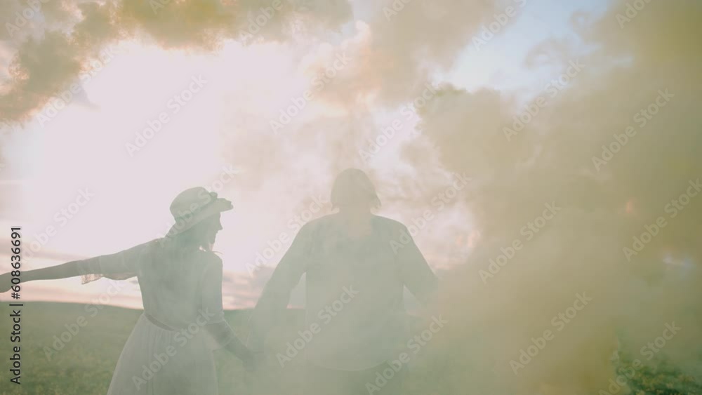 Happiness, young couple in nature, man and a woman are running through ...