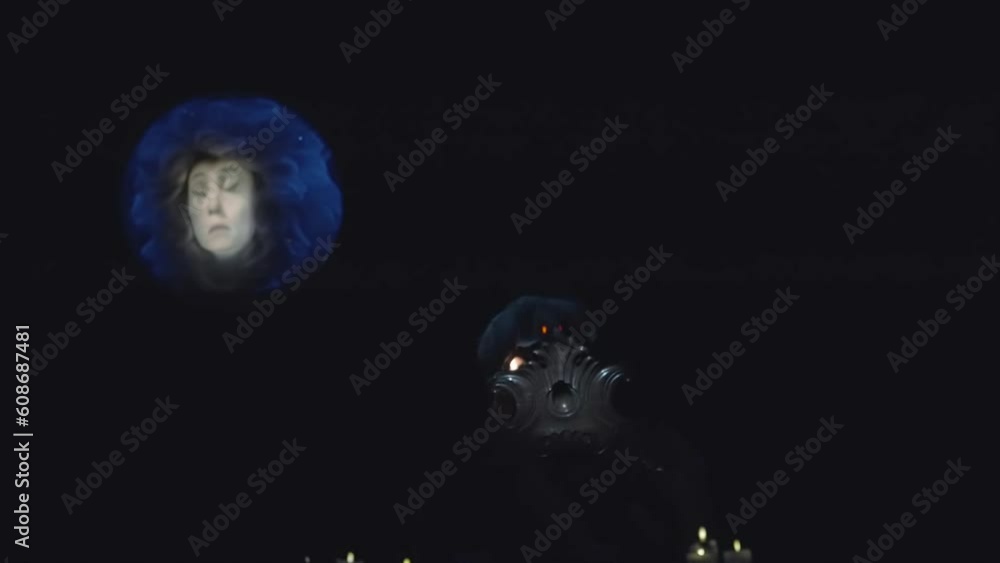 This video shows a creepy floating head in a crystal ball and an ...