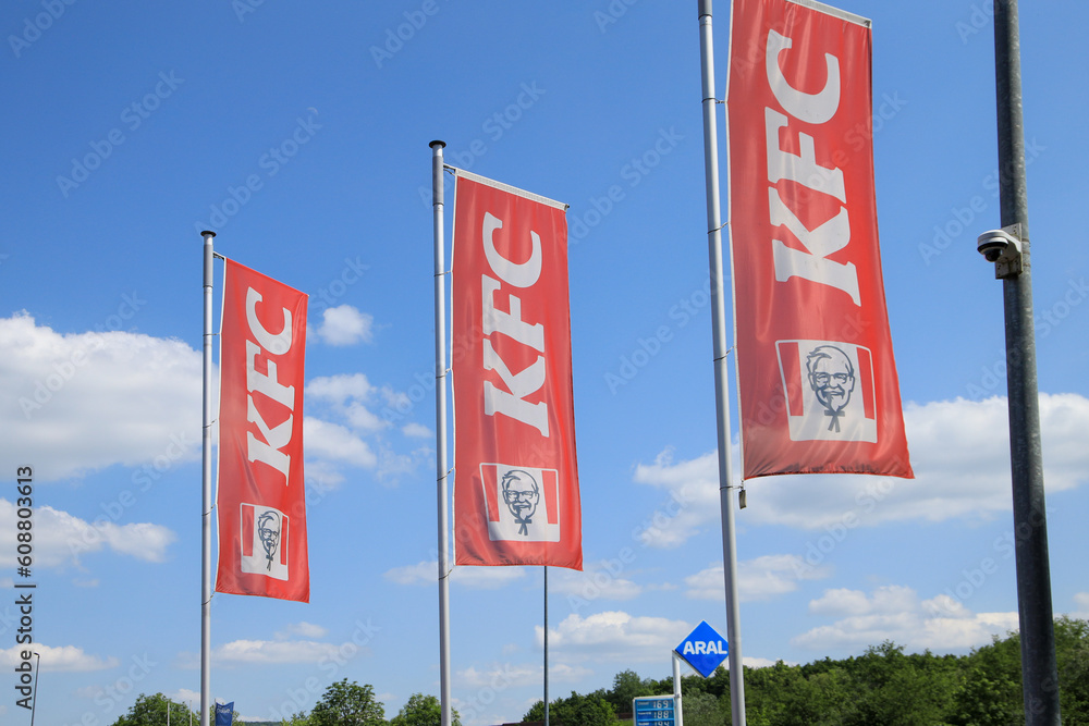 Kentucky Fried Chicken - KFC, blowing flags on a Gas station in Bavaria ...