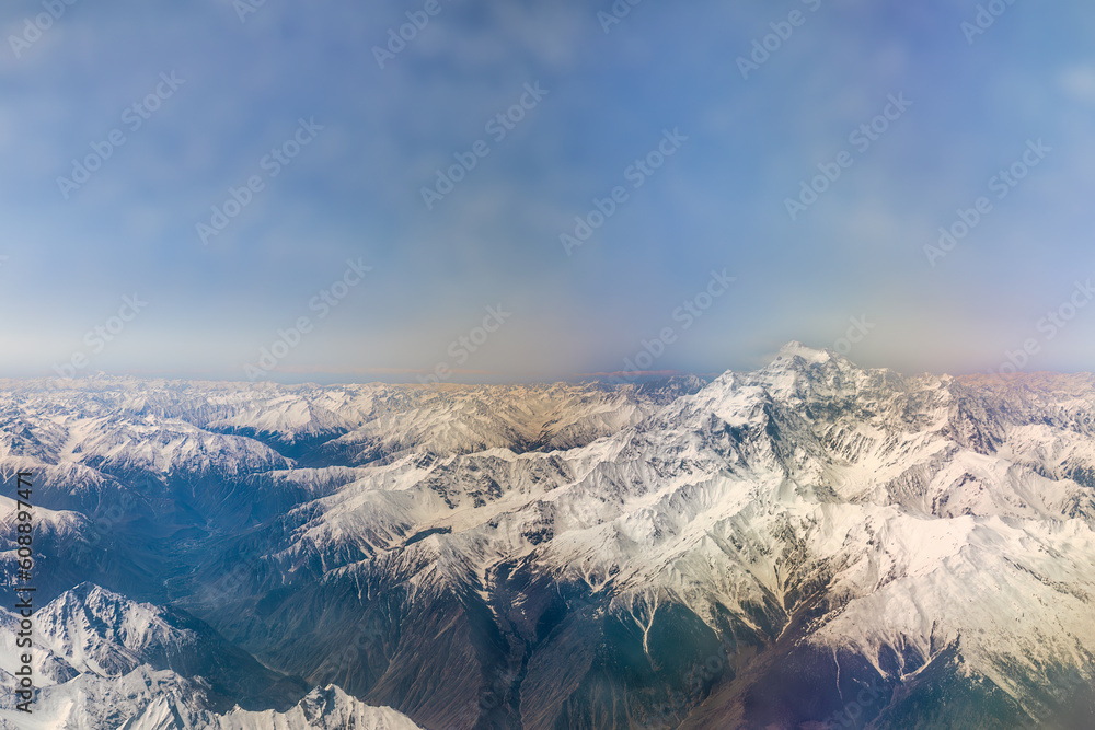 Majestic heights unveiled: A captivating aerial view from a commercial ...