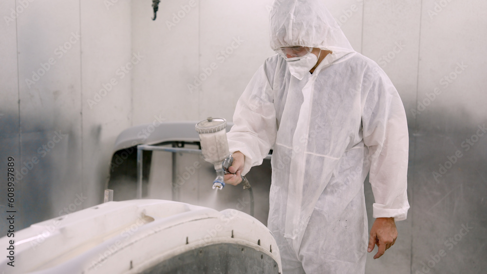 Car painters wear PPE over their heads and goggles over their mouths ...