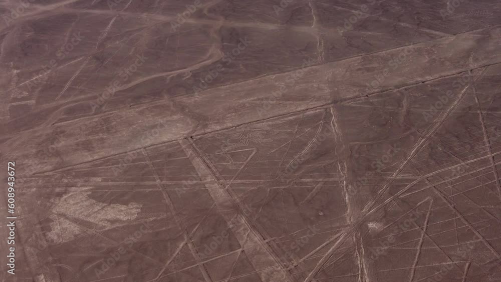 Aerial video of the famous Nazca Lines. Drone flies above many long ...