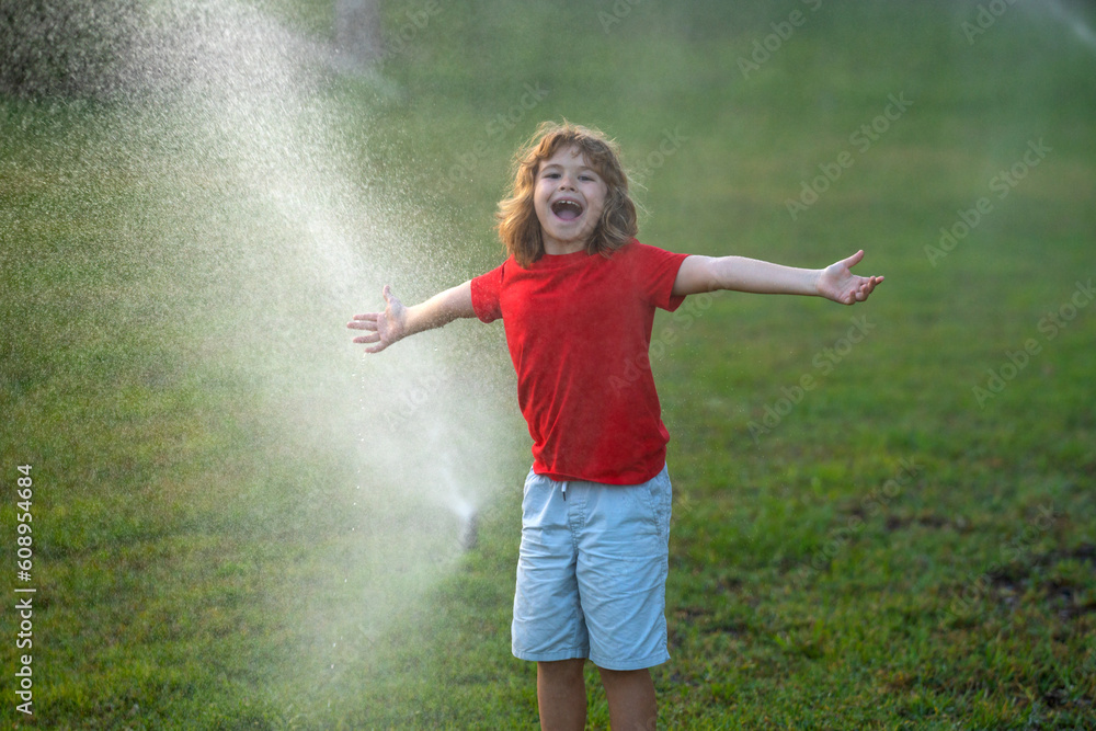 Cute little kid play in garden at summer day. Child enjoy summer in ...
