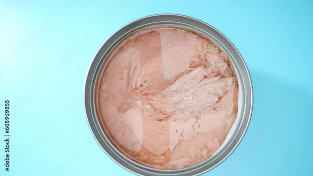Experience the captivating allure of canned tuna in mesmerizing video ...