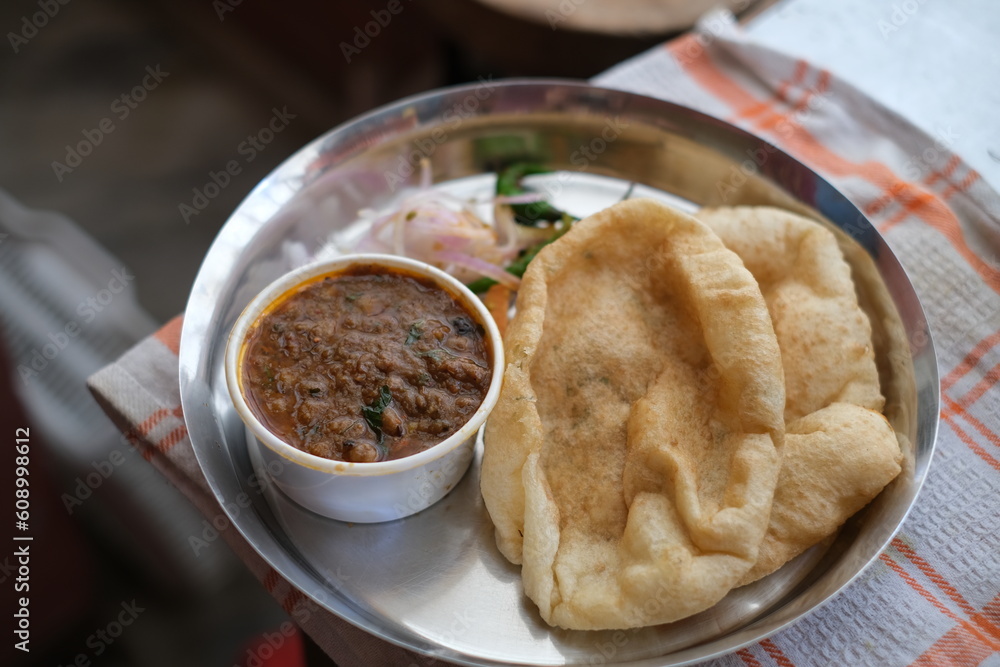 Close up shot of chole bhature, famous street food in Delhi India ...